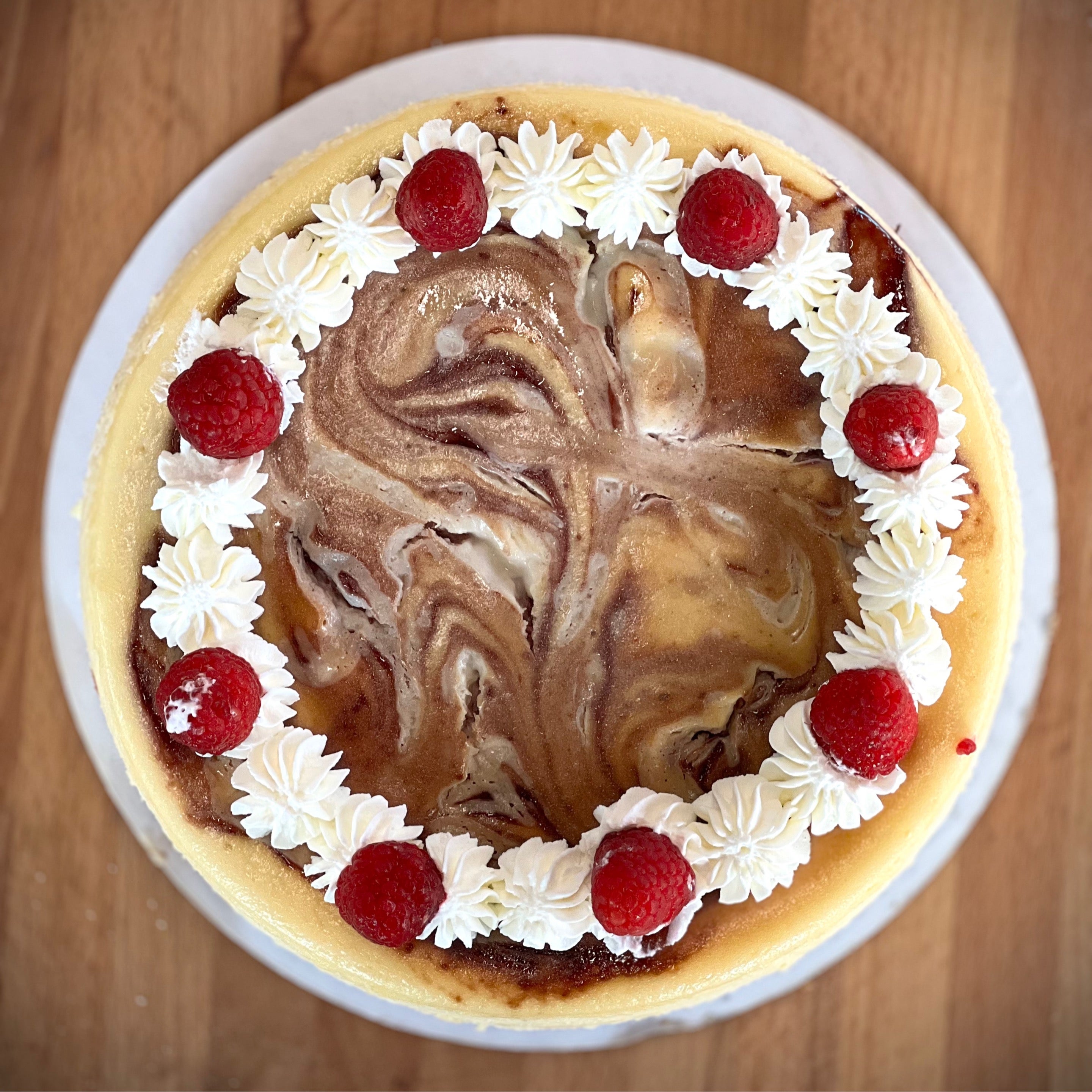 Raspberry Swirl Cheesecake | The Cow Path Bakery